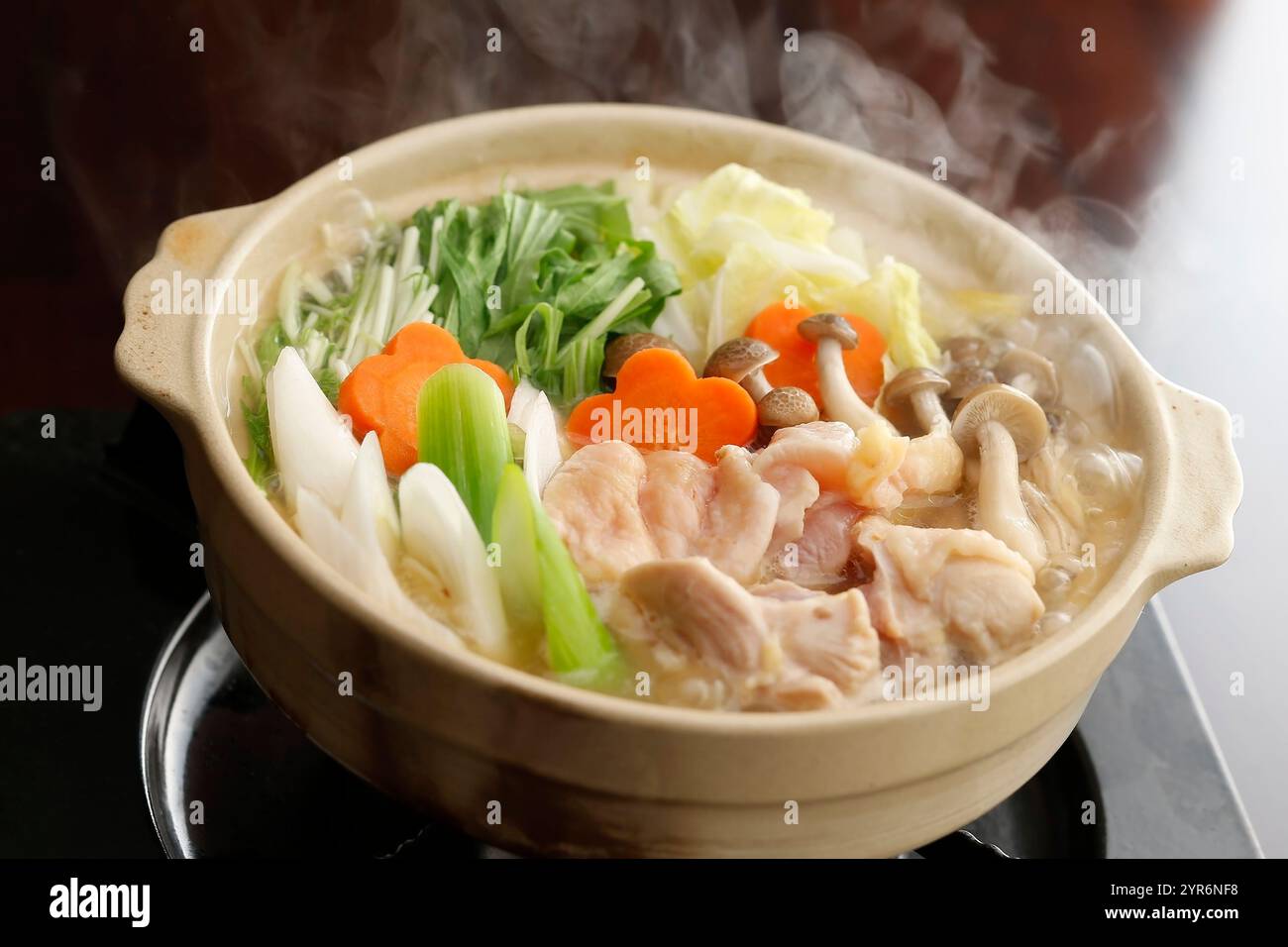 Chicken cooked in a pot Stock Photo - Alamy