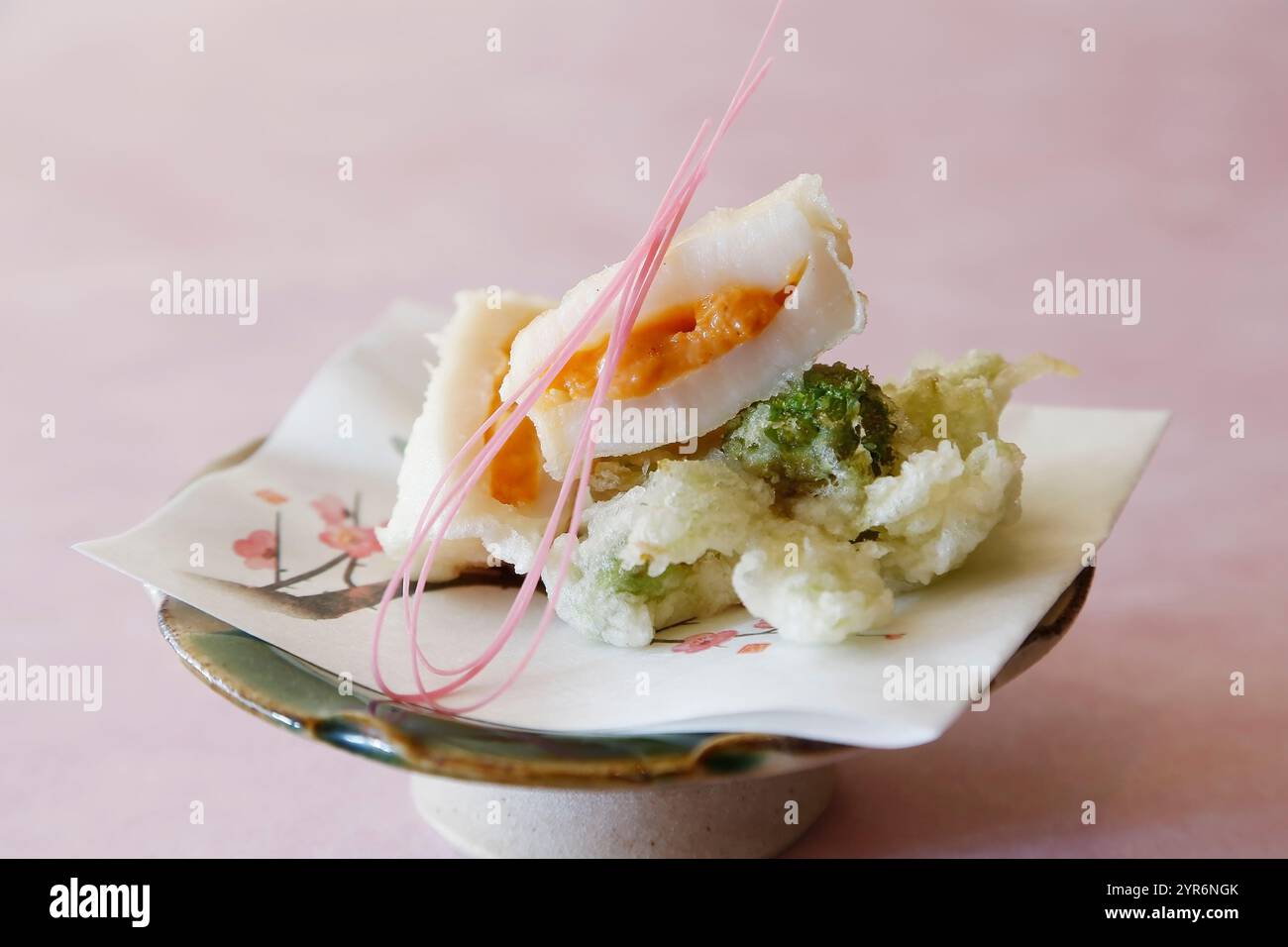 Deep-fried sea urchin with lotus root Stock Photo - Alamy