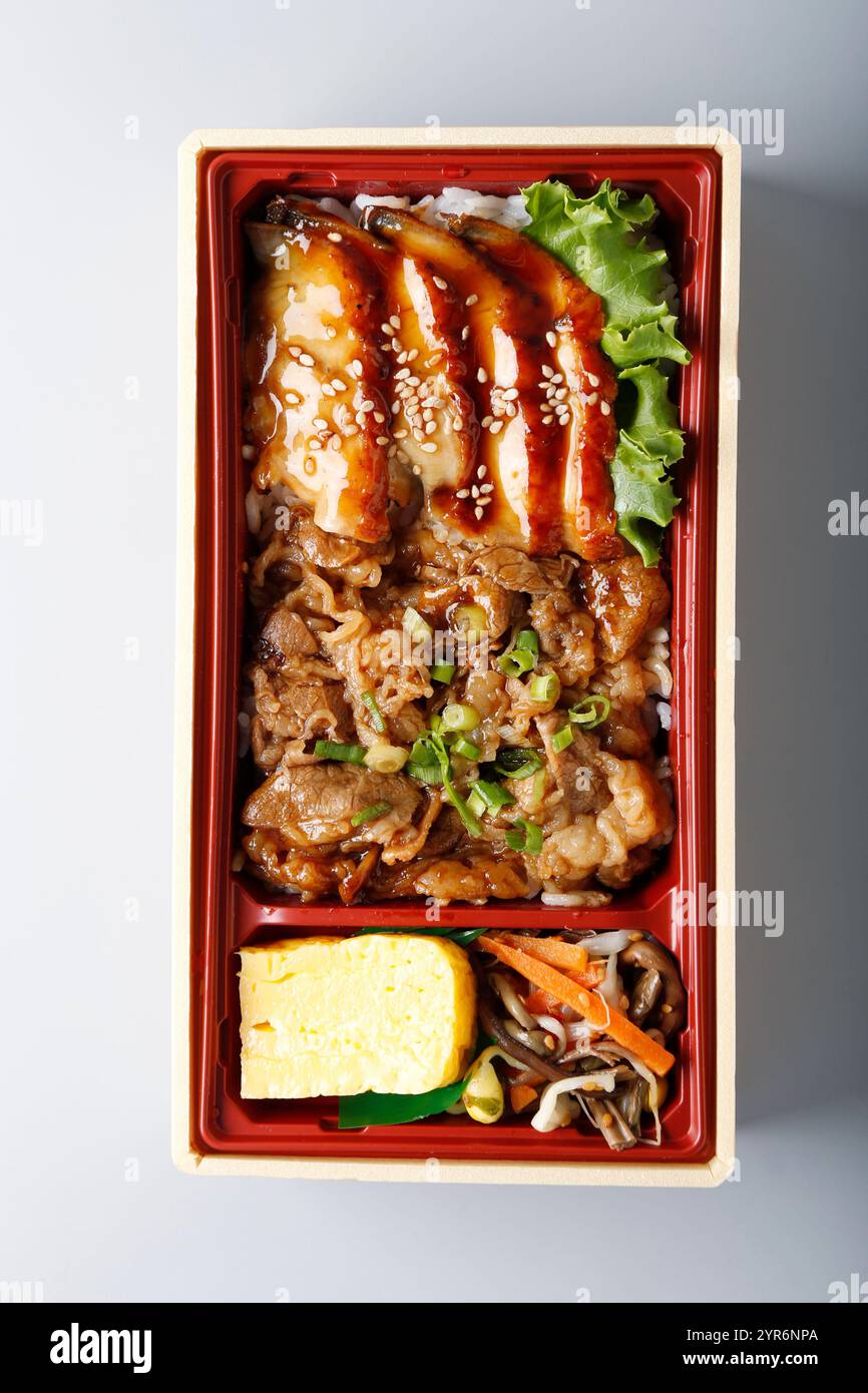 Eel and beef lunch box Stock Photo - Alamy