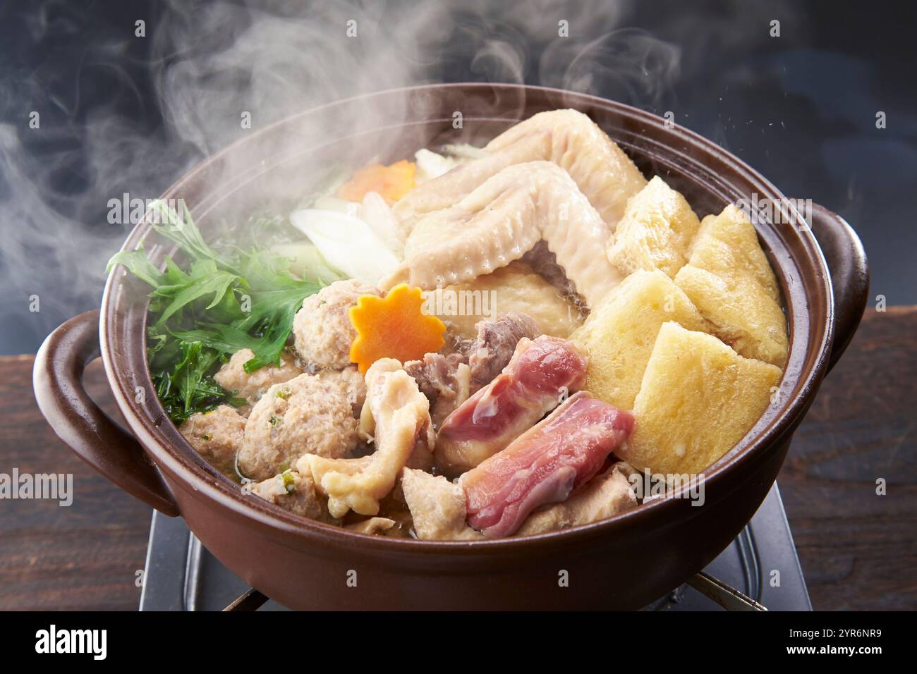 Chicken cooked in a pot Stock Photo - Alamy