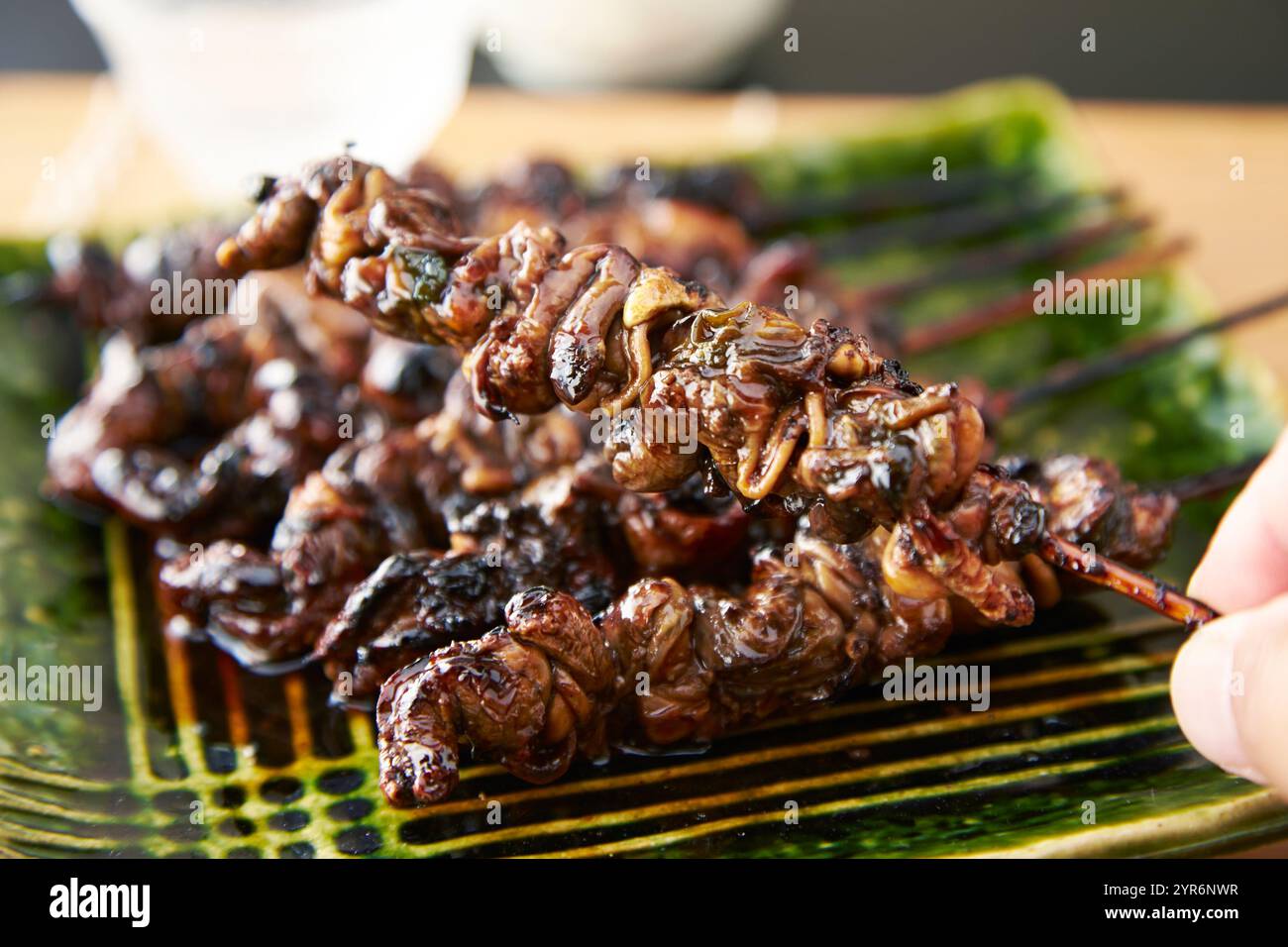 Grilled eel liver skewer Stock Photo - Alamy