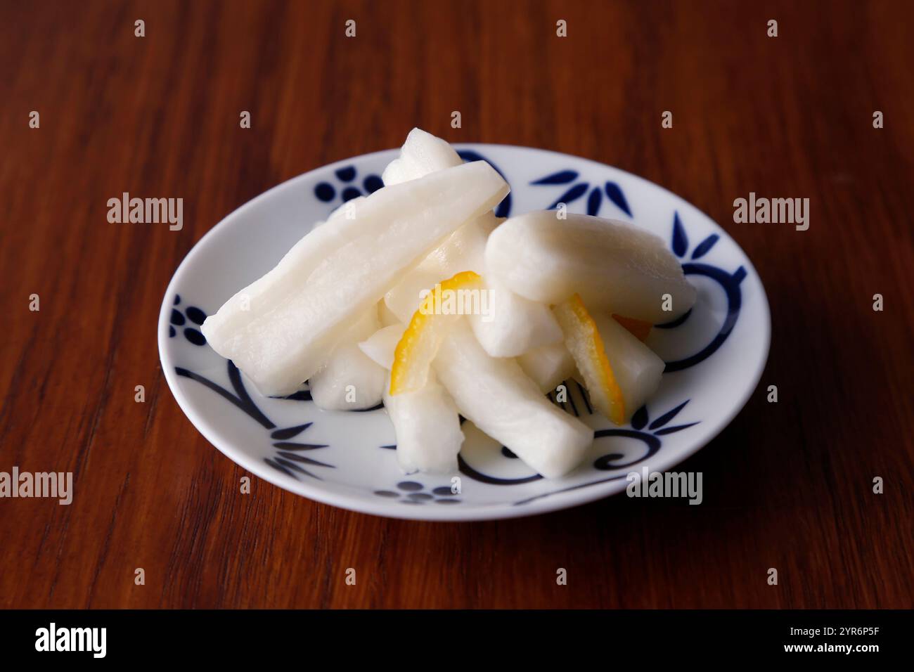 Pickled radish with sweet vinegar and yuzu flavour (wooden back Stock ...