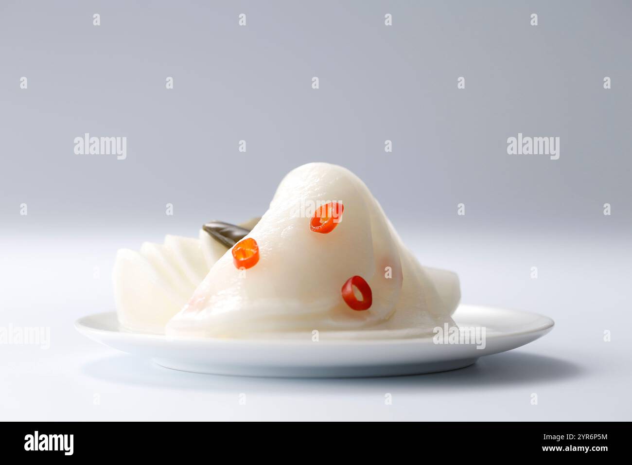 Pickled radish with sweet vinegar and pickled radish strips (white ...