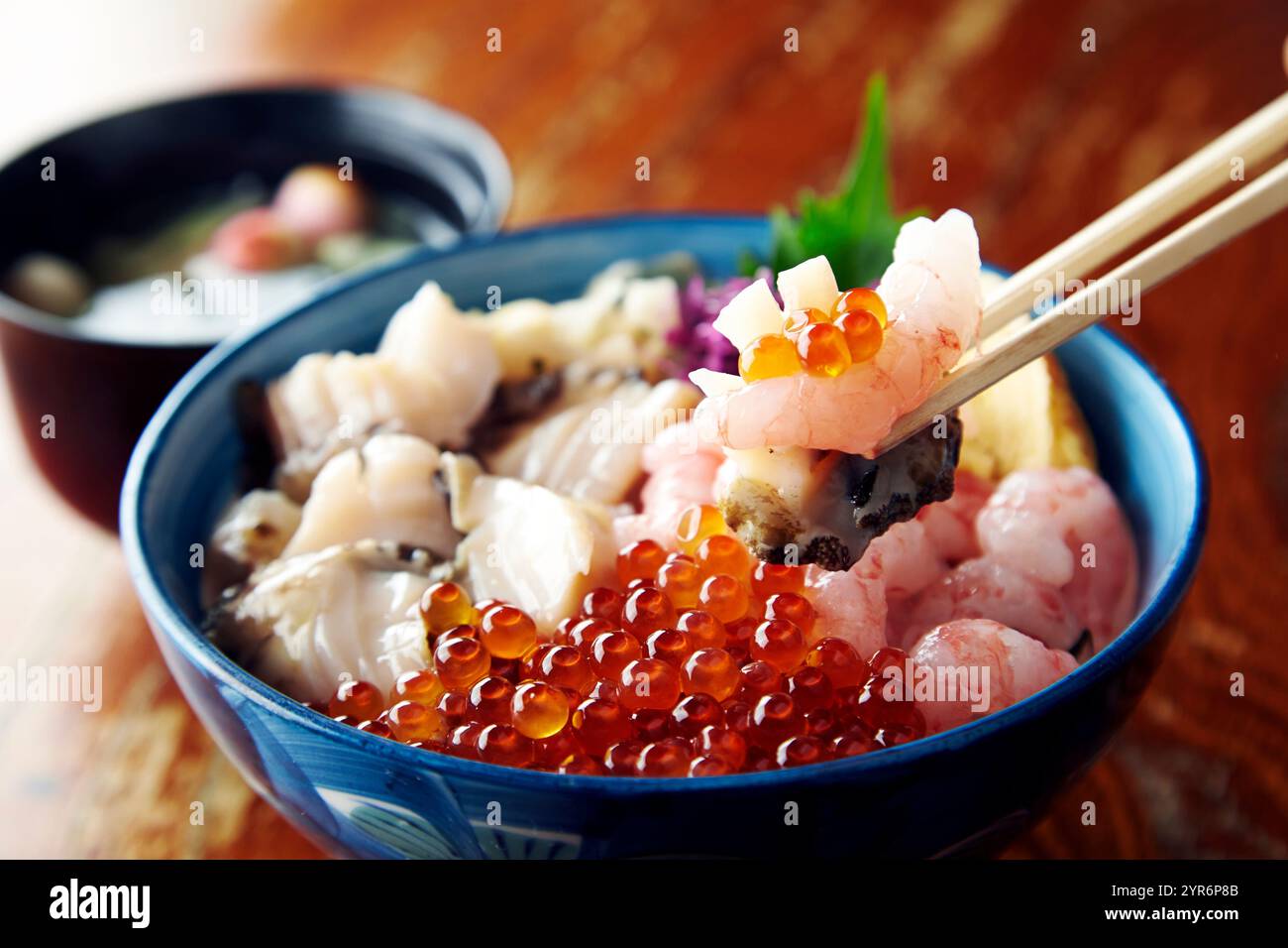 Kaisen-don with live abalone, shrimp and salmon roe Stock Photo - Alamy