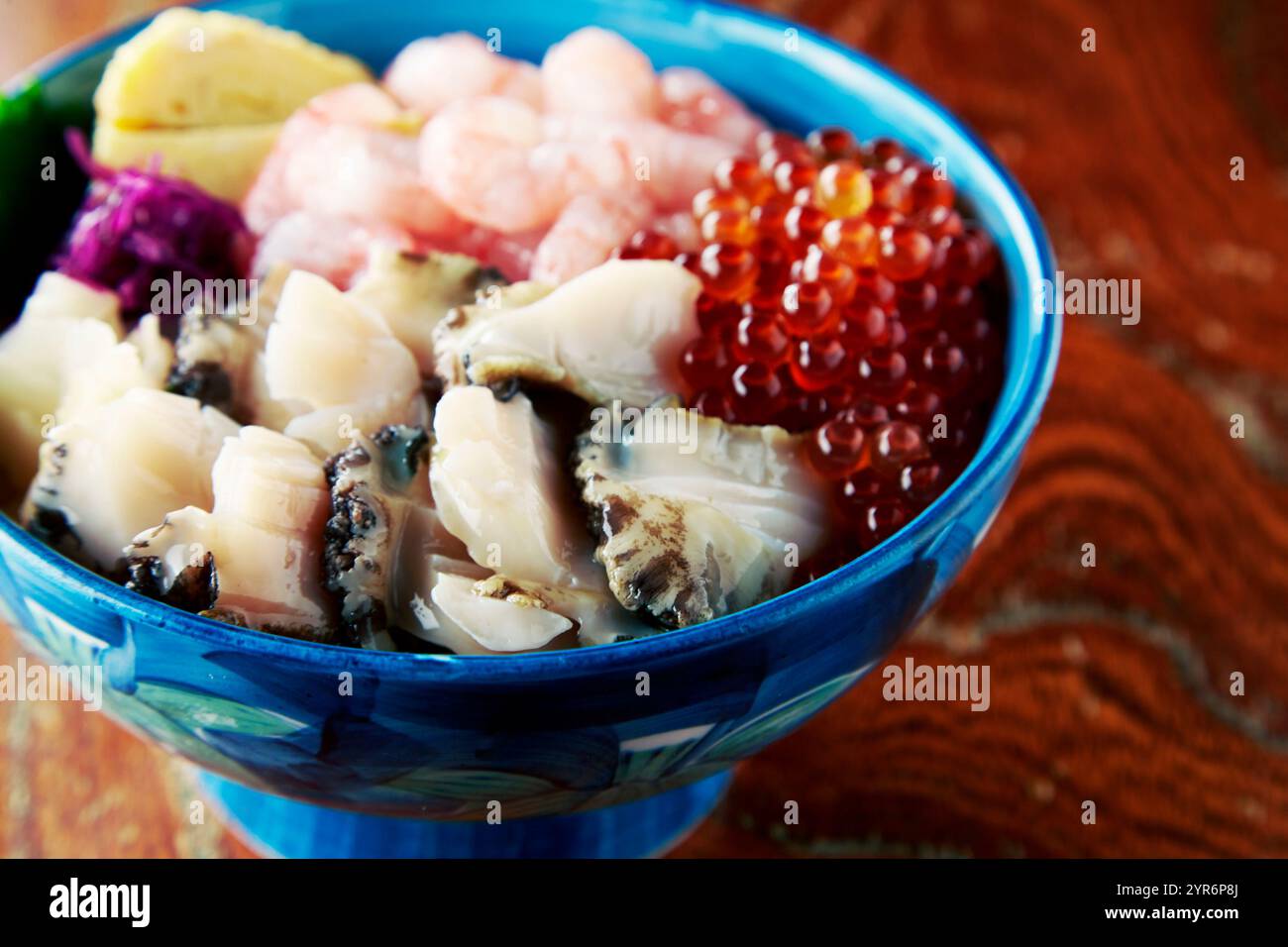 Kaisen-don with live abalone, shrimp and salmon roe Stock Photo - Alamy