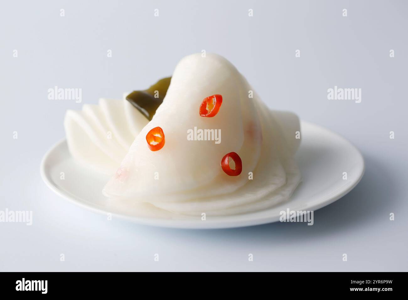 Pickled radish with sweet vinegar and pickled radish strips (white ...