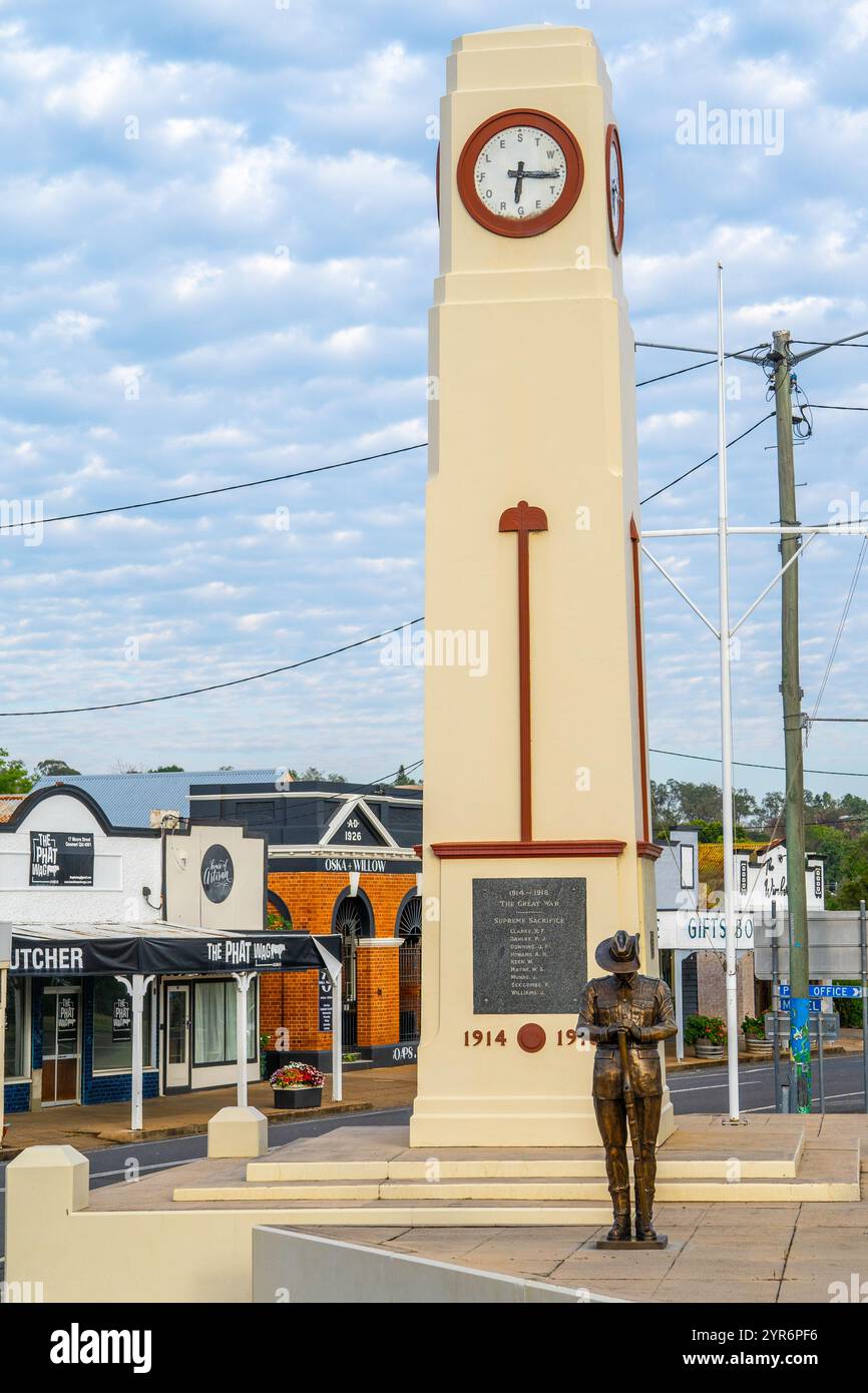 War memorial and 'Lest We Forget' Clock tower in main Street of Goomeri ...