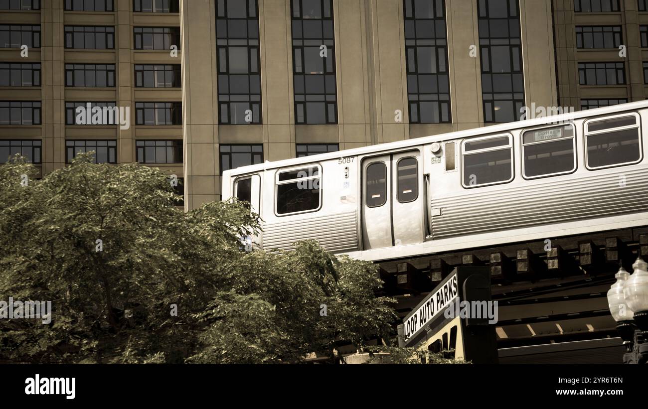 SEPTEMBER 2021, CHICAGO, ILLINOIS, USA - Chicago elevated subway train known as the "L" is run ...