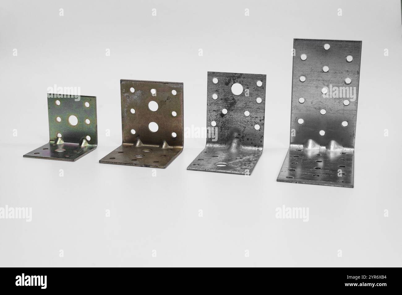 metal corners for fasteners. different sizes Stock Photo - Alamy