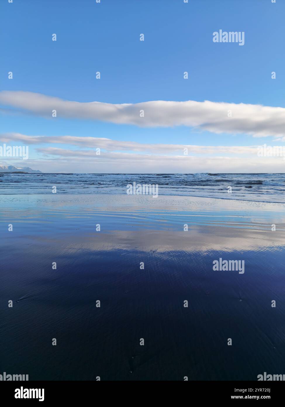 Atlantic ocean with black sand beach in natural majestic landscape ...