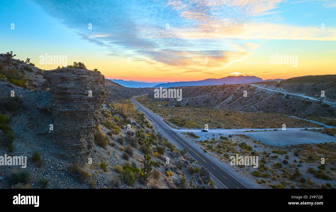 Aerial of Desert Road and Rock Formation at Golden Hour Stock Photo - Alamy