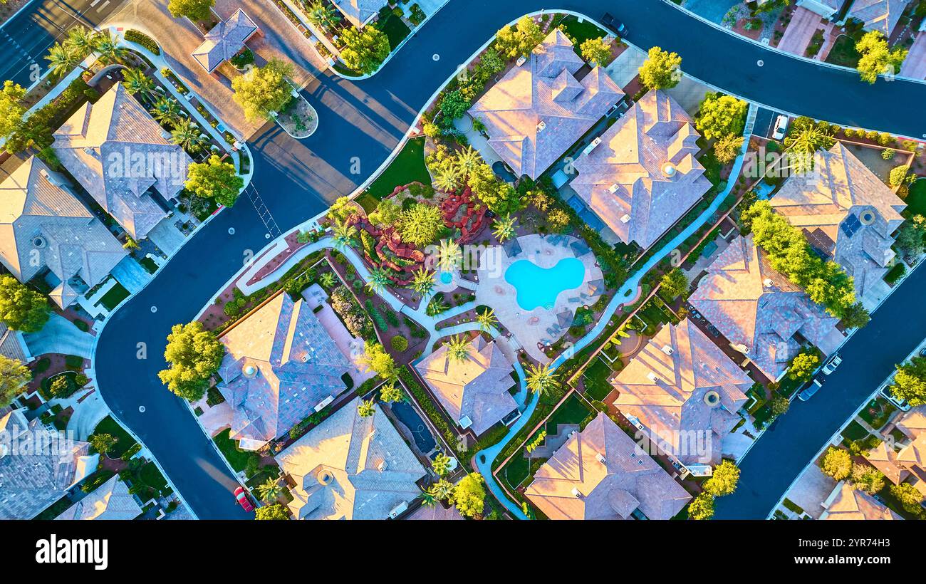 Aerial of Suburban Neighborhood with Pool in Golden Hour Light Stock ...