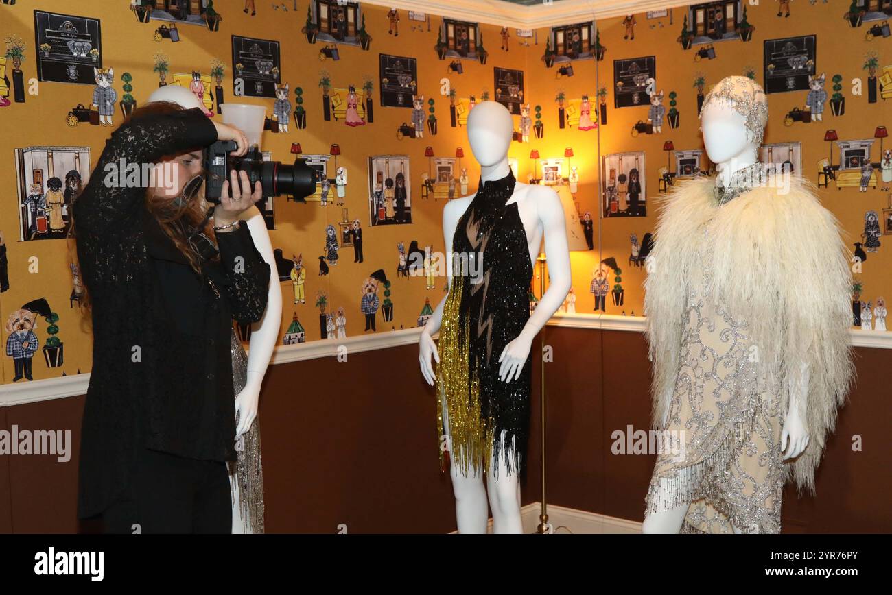 December 2, 2024, New York, New York, USA: A photographer takes a ...