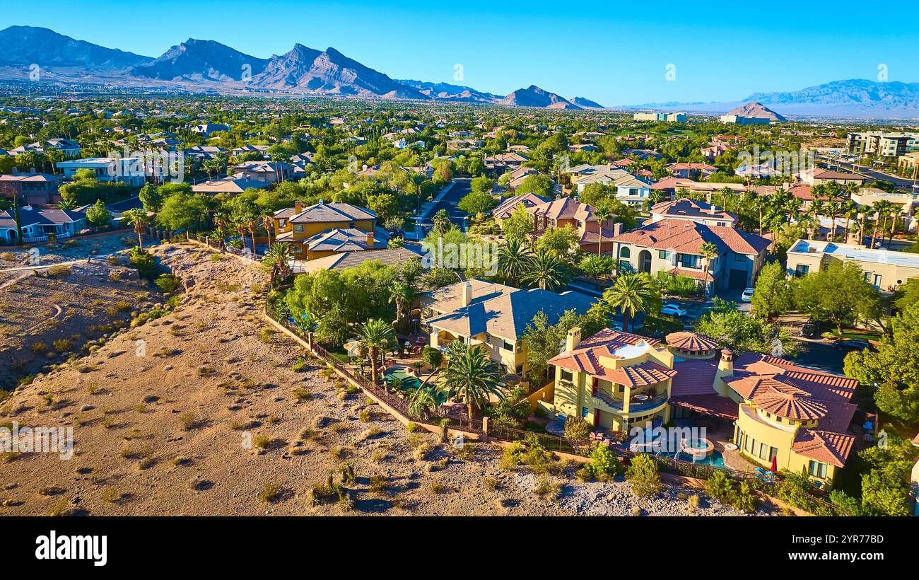 Aerial of Upscale Desert Oasis with Mountain Backdrop Stock Photo - Alamy