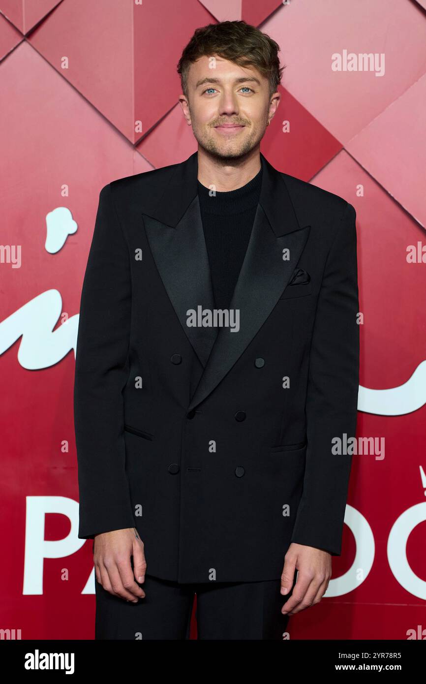 Roman Kemp poses for photographers upon arrival at the The Fashion ...