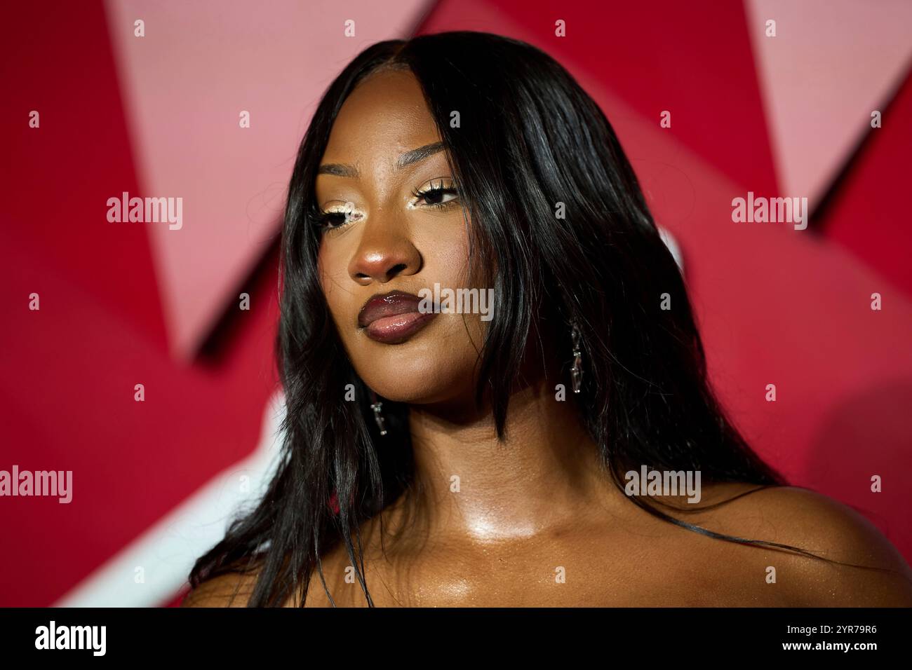 Tems poses for photographers upon arrival at the The Fashion Awards ...