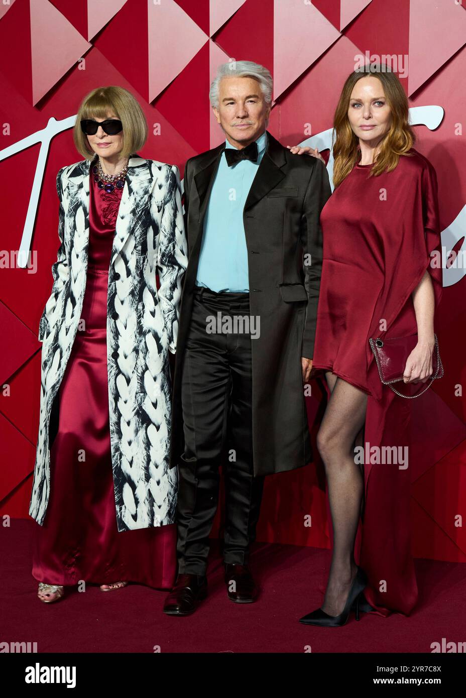 Anna Wintour, from left, Baz Luhrmann and Stella McCartney pose for ...