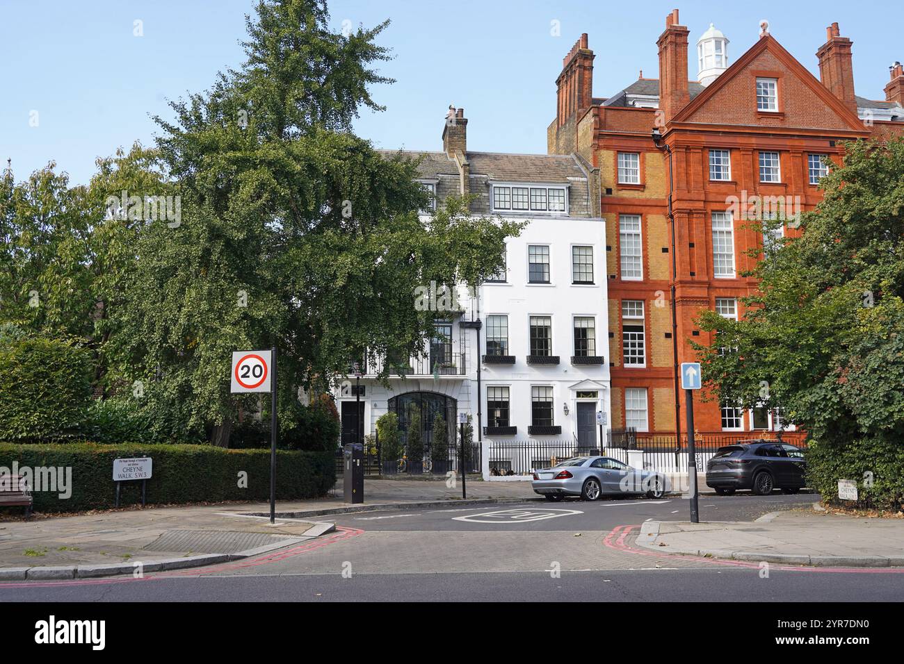 Cheyne Walk in Chelsea, a historic street facing the Thames River, with ...