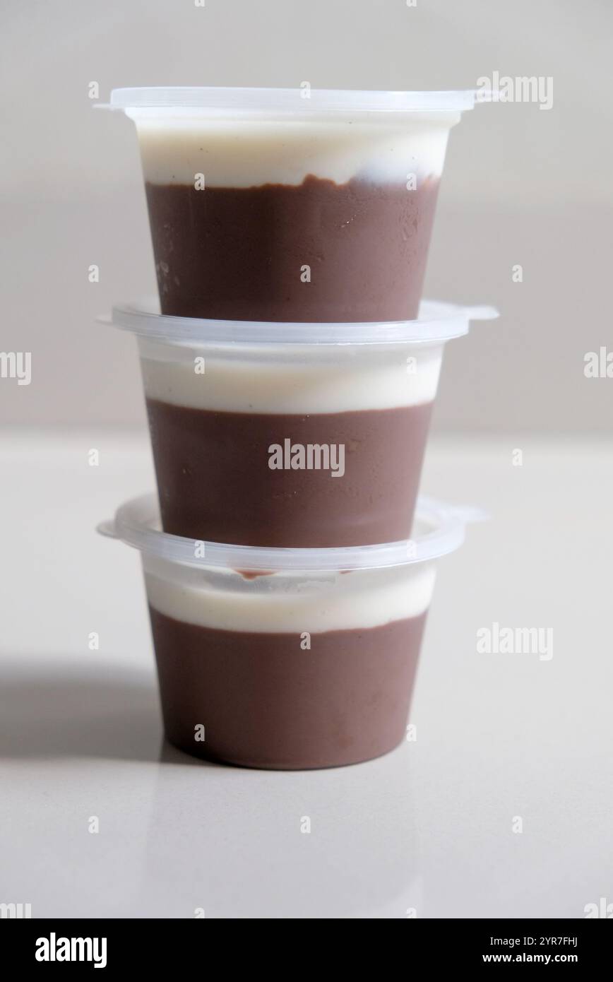 Chocolate pudding dessert with vanilla fla in a plastic cup Stock Photo ...