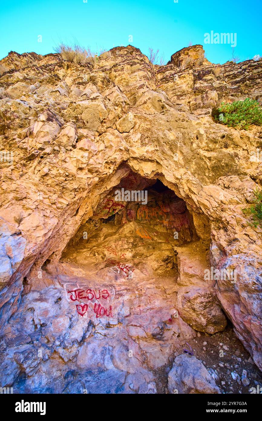 Cave Entrance with Graffiti in Desert Landscape Eye-Level Exploration ...