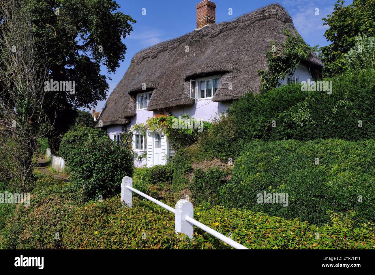 Arkesden: Thatched cottage, stream and white fence at Arkesden, Saffron ...