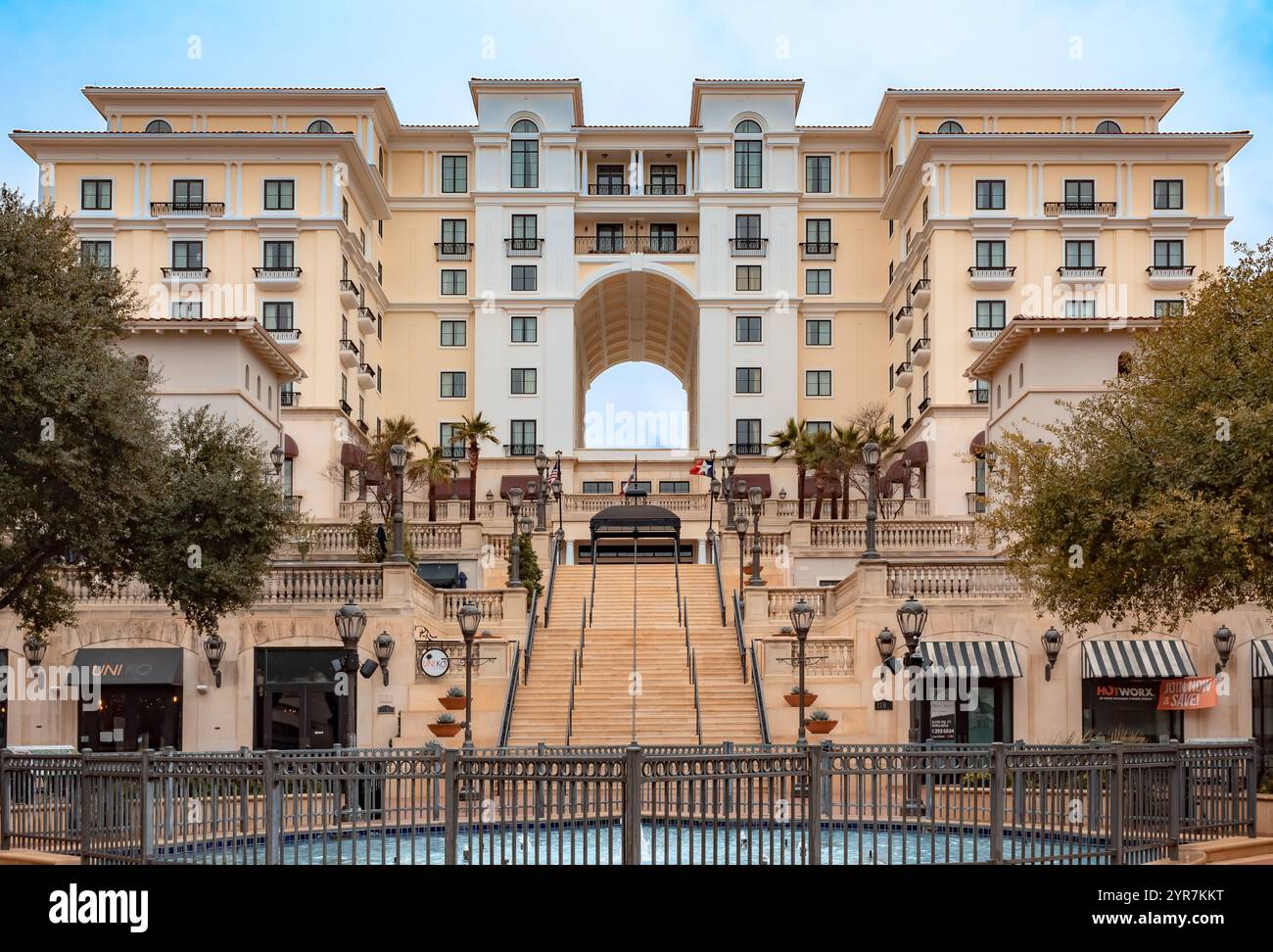 Massive architecture building exterior, fountain, and walkway of the ...