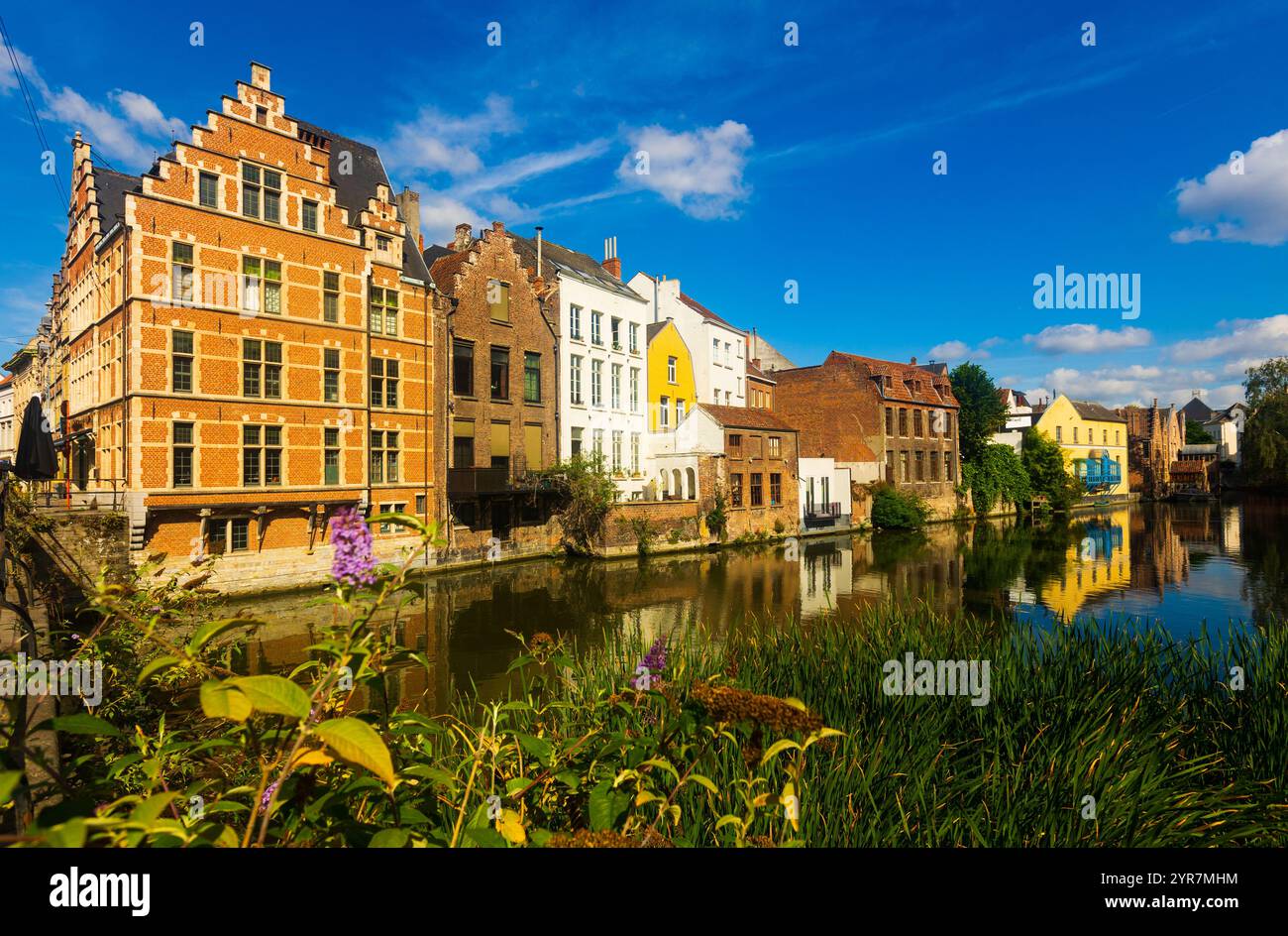 Typical residential buildings in historic center of Ghent along Leie ...