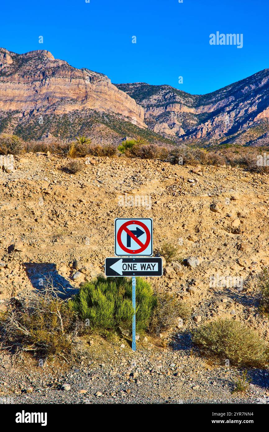 Desert Road Signs with Majestic Mountains Eye-Level View Stock Photo ...