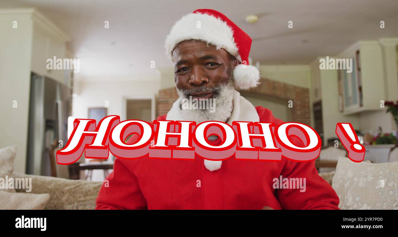 Image of hohoho text over santa claus with presents Stock Photo - Alamy
