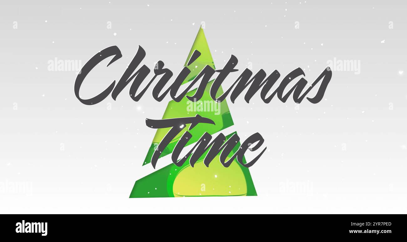 Image of christmas time text and snow falling over christmas tree in ...