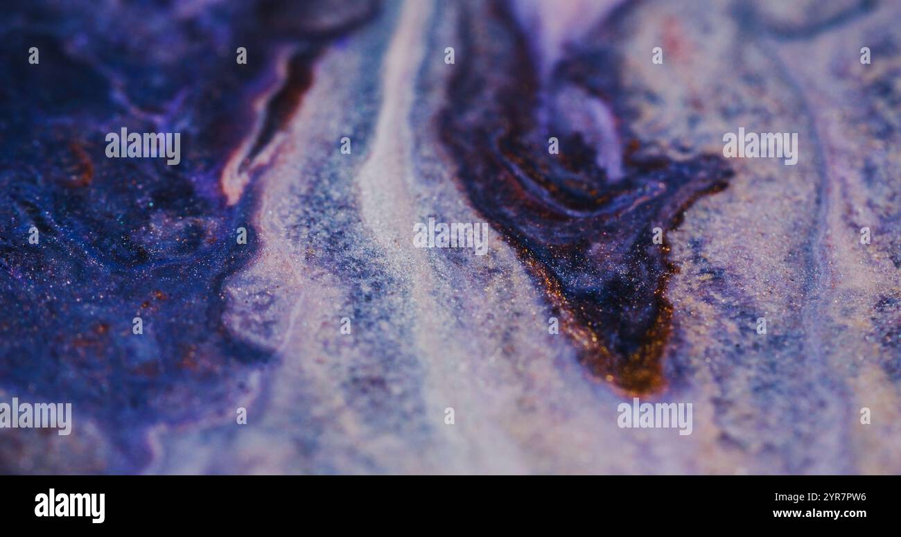 Paint ink blend. Shiny fluid spill. Defocused multicolor purple ...