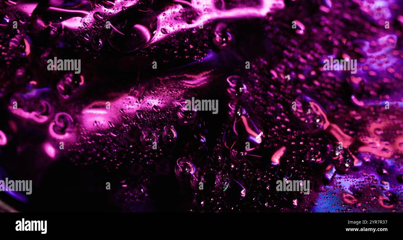 Flickering dew. Purple drops. Mystical defocused shiny area covered ...