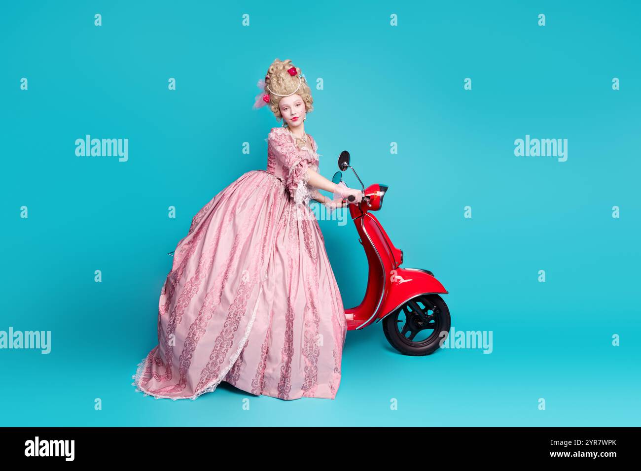 Photo of charming pretty lady victorian era pompous gown driving moped ...