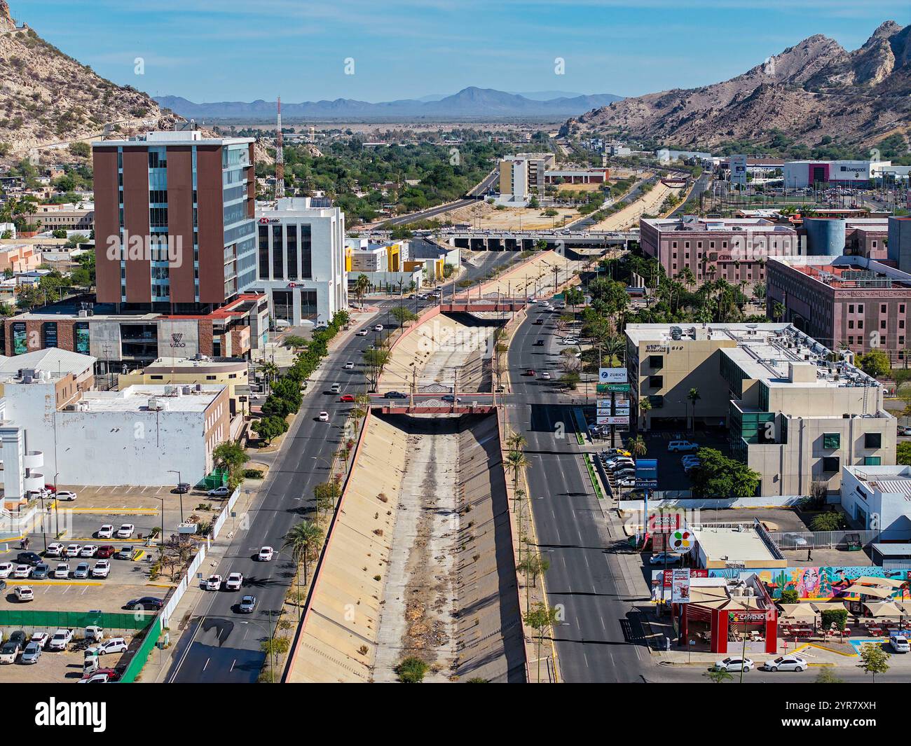 Concrete stormwater canal Boulevard Paseo Rio at the river ford in ...