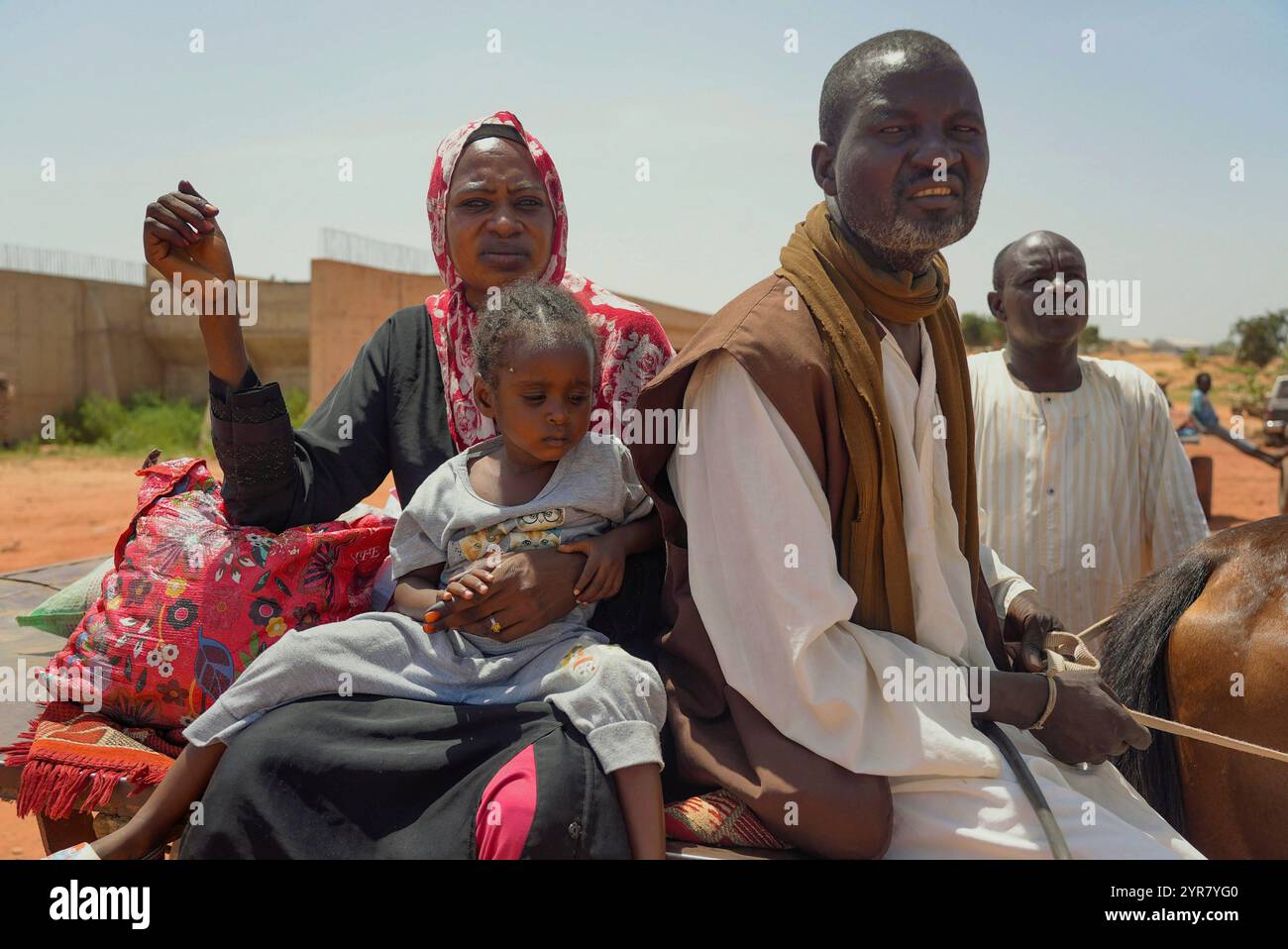 Ousmane Taher and his family cross from Sudan into Chad near Acre ...
