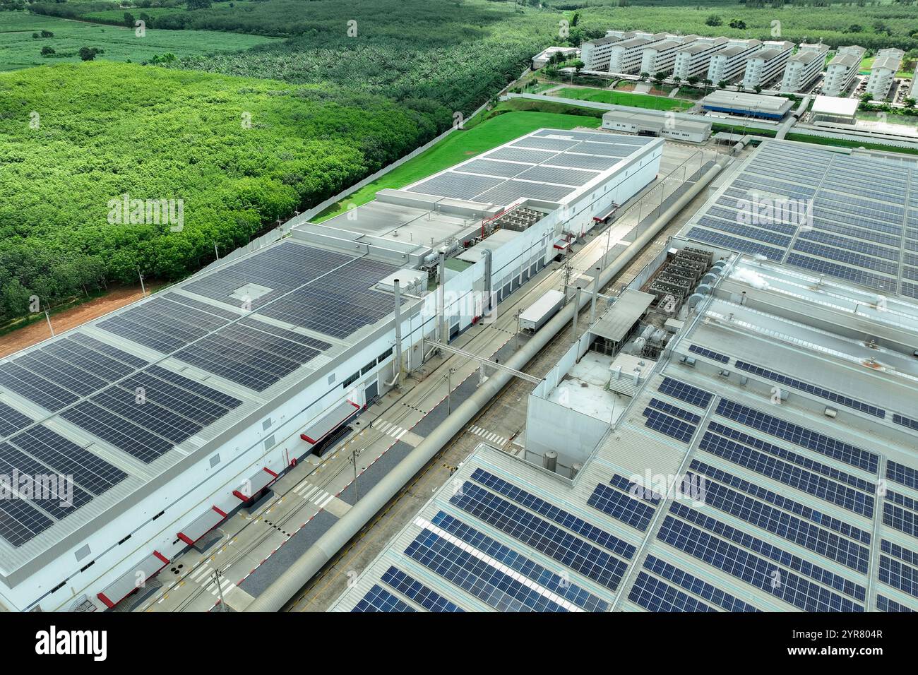 Solar energy for factory and warehouse building. Solar panels on roof ...
