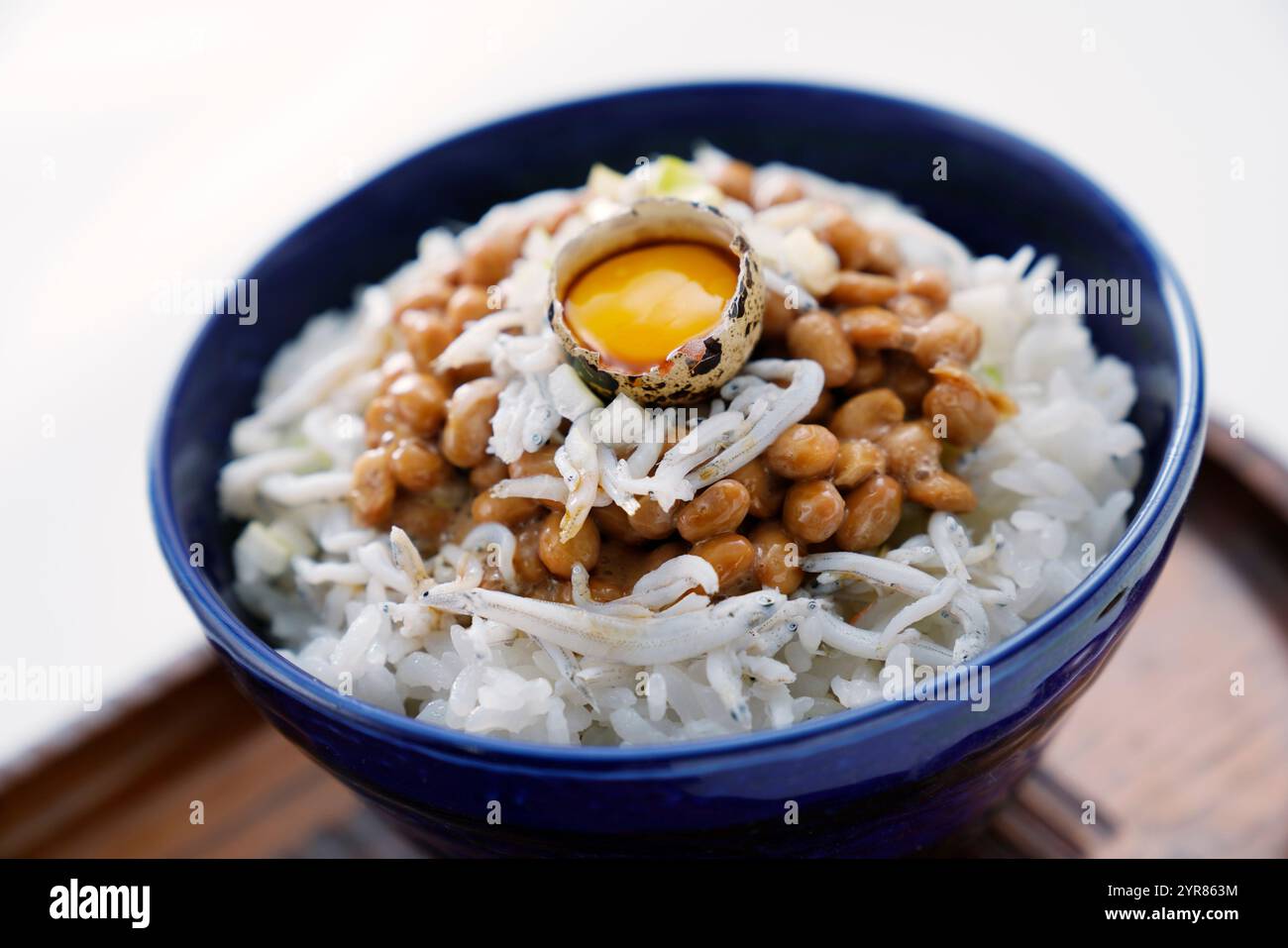 Rice with natto and baby sardine and quail egg Stock Photo - Alamy