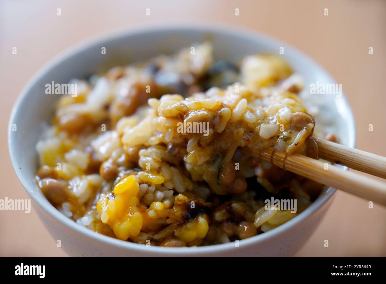 Rice mixed with hot spring egg, natto and nori Stock Photo - Alamy