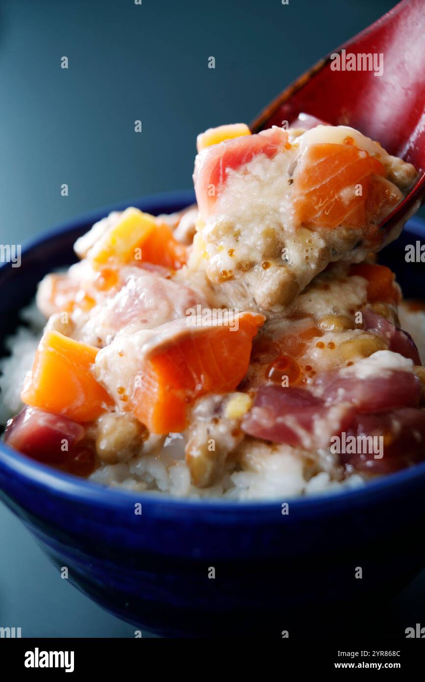 Process photo of a bowl of natto and natto with seafood Stock Photo - Alamy