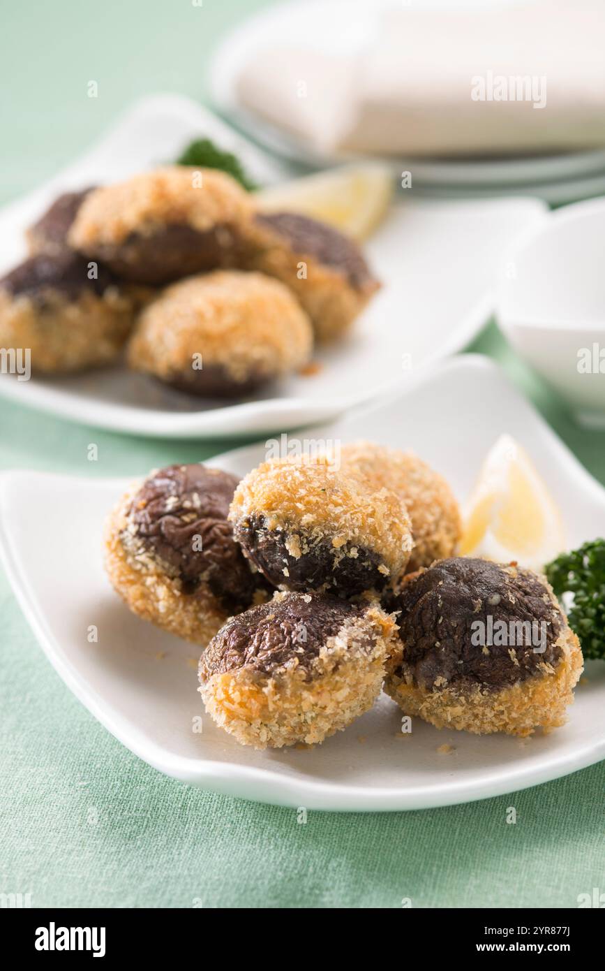 Fried shiitake mushroom stuffed with meat Stock Photo - Alamy