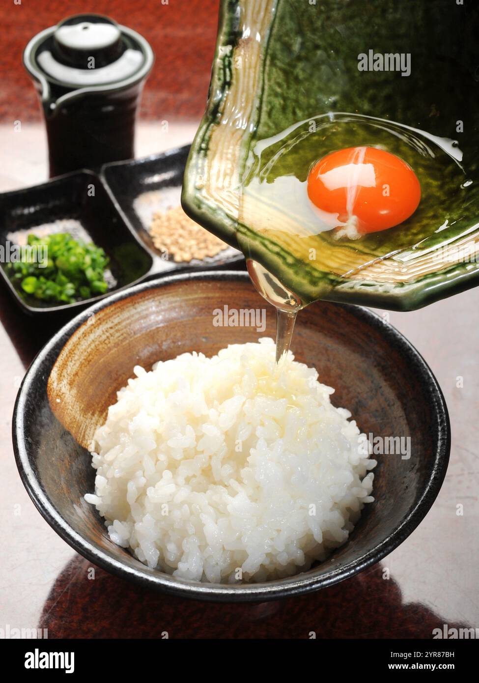 Japanese meal Egg on rice Stock Photo - Alamy