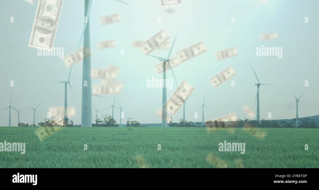 Wind turbines in green field with falling money image Stock Photo - Alamy