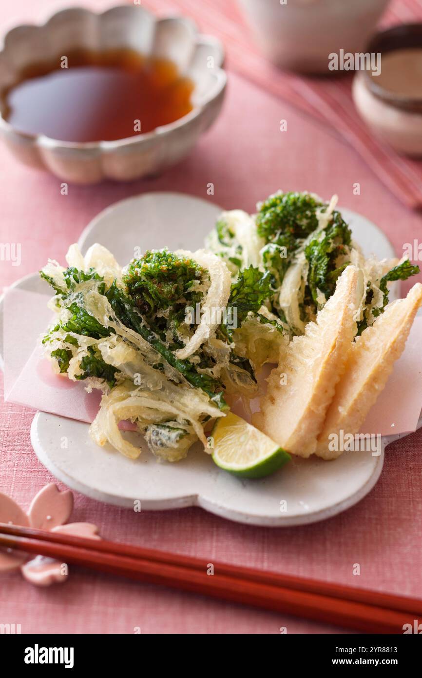 Tempura of rapeseed and new onion with tempura of bamboo shoot Stock ...