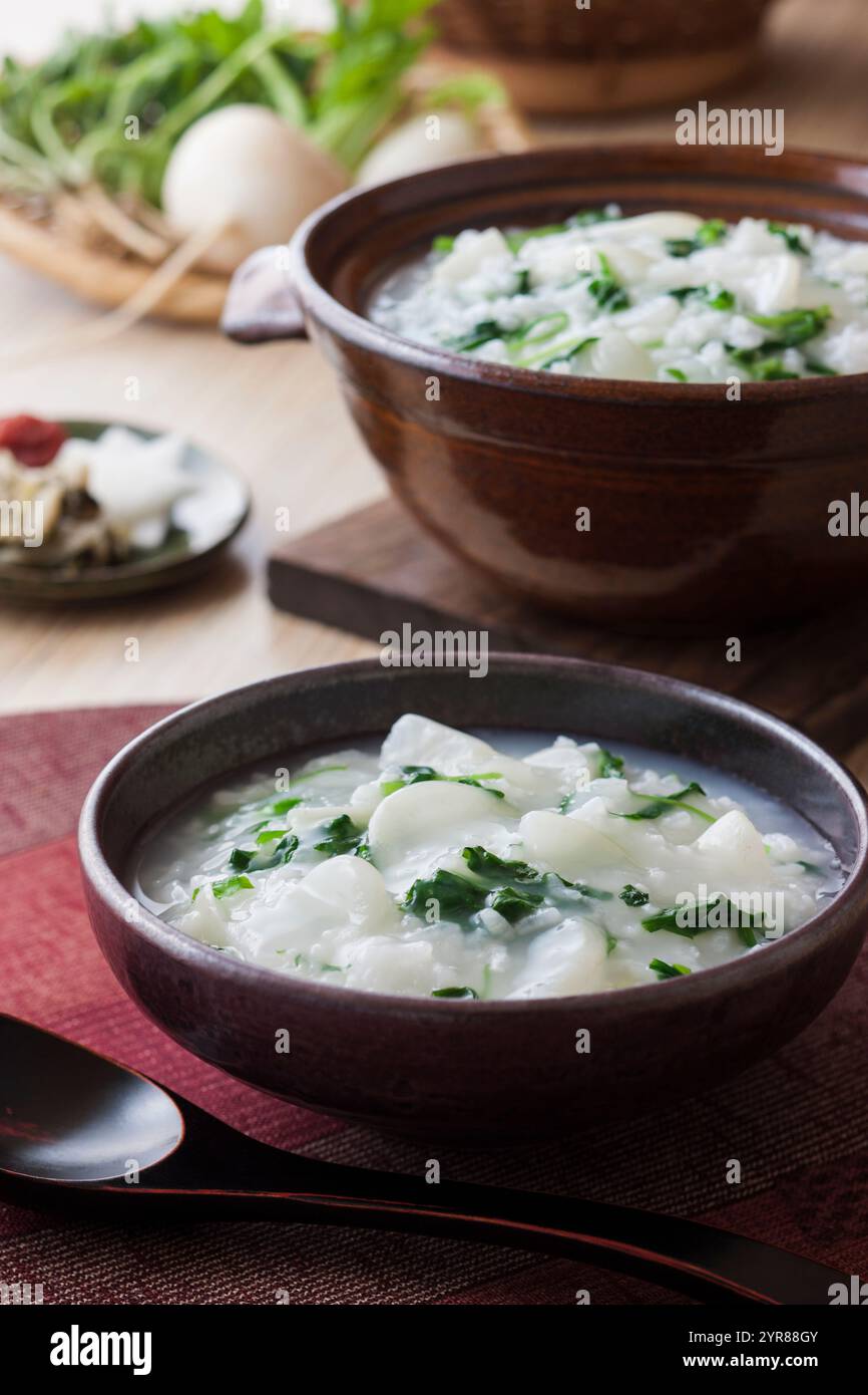 Spring rice gruel with seven herbs Stock Photo - Alamy