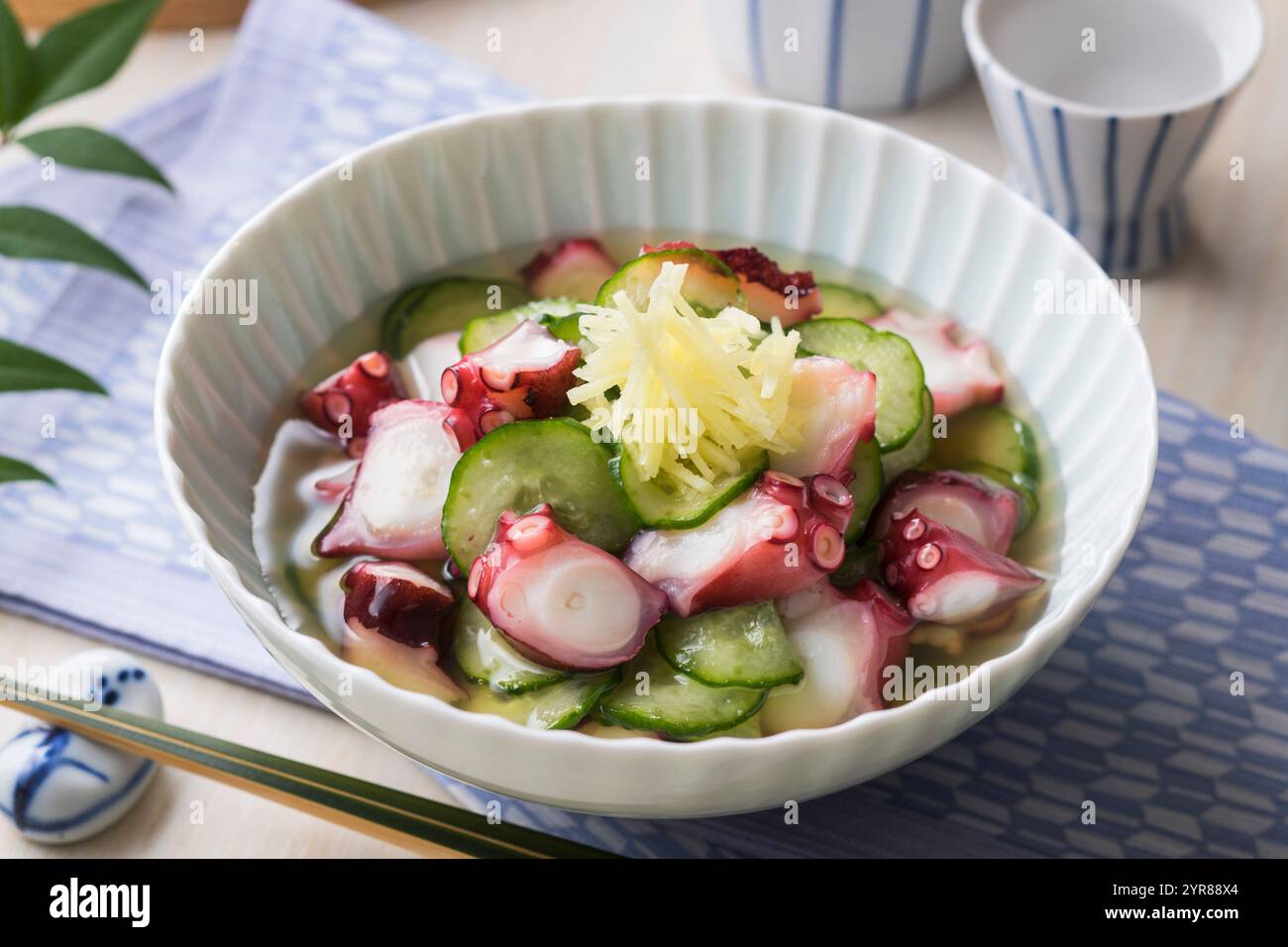 Vinegared octopus and cucumber Stock Photo - Alamy