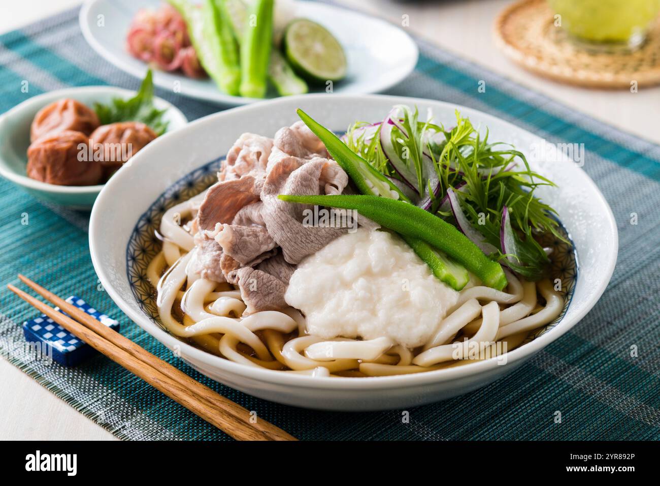 Chilled udon noodles with pork shabu and yam Stock Photo - Alamy