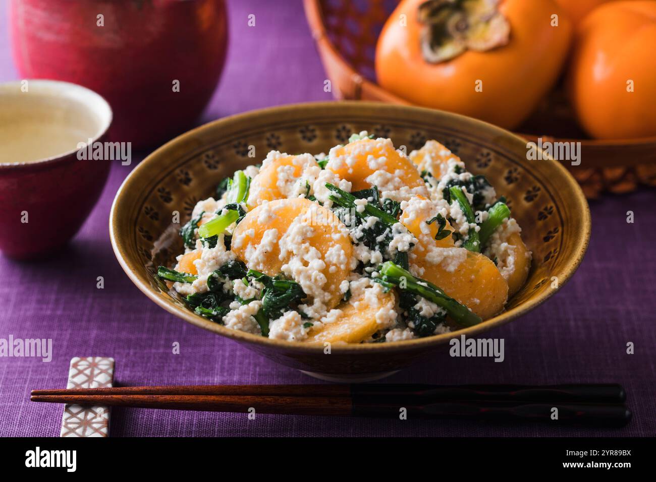 Tofu paste with persimmon and garland chrysanthemum Stock Photo - Alamy