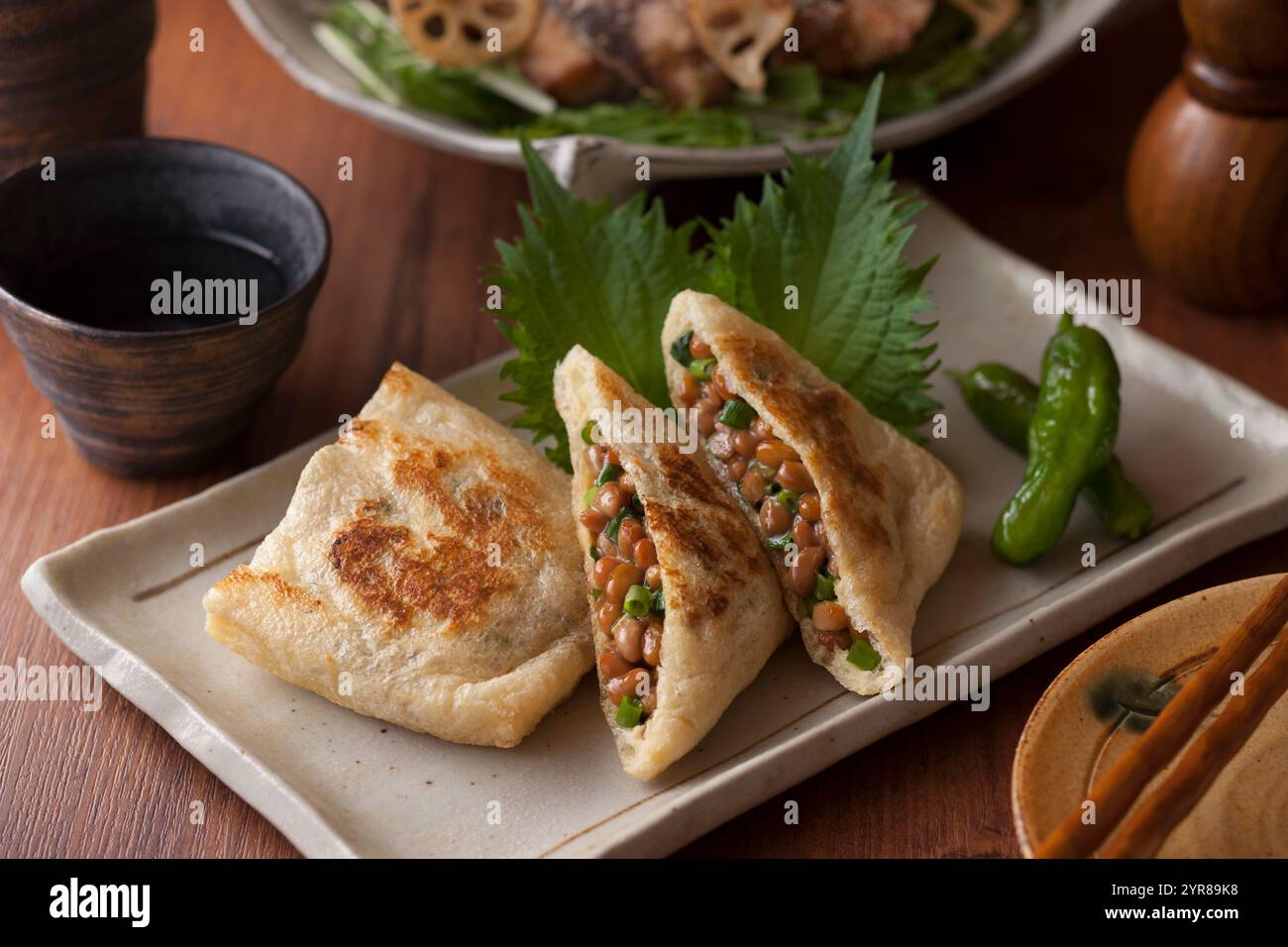 Deep-fried deep-fried tofu with natto clams Stock Photo - Alamy