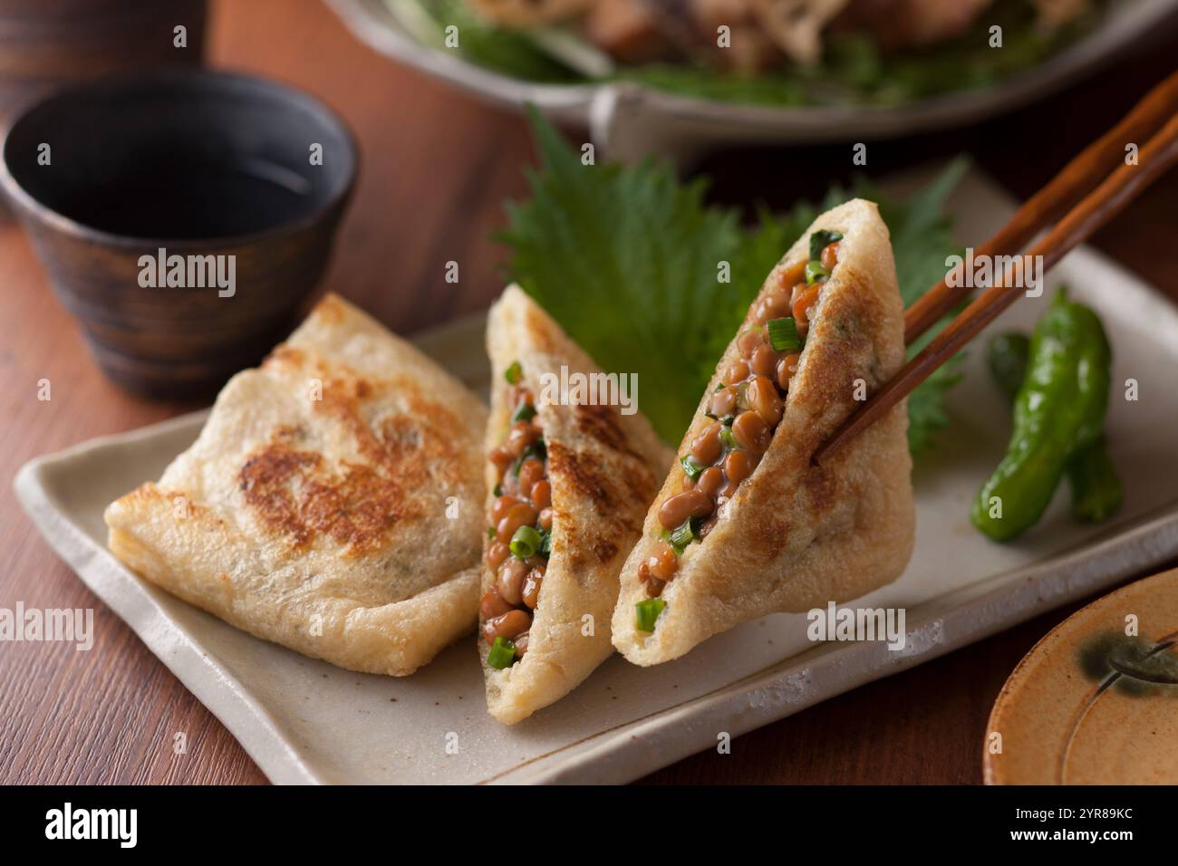 Deep-fried deep-fried tofu with natto clams Stock Photo - Alamy