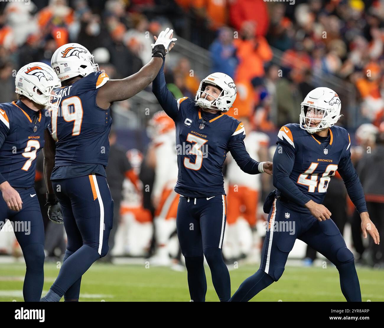 December 2, 2024, Denver, Colorado, USA: Broncos K WILL LUTZ high fives ...